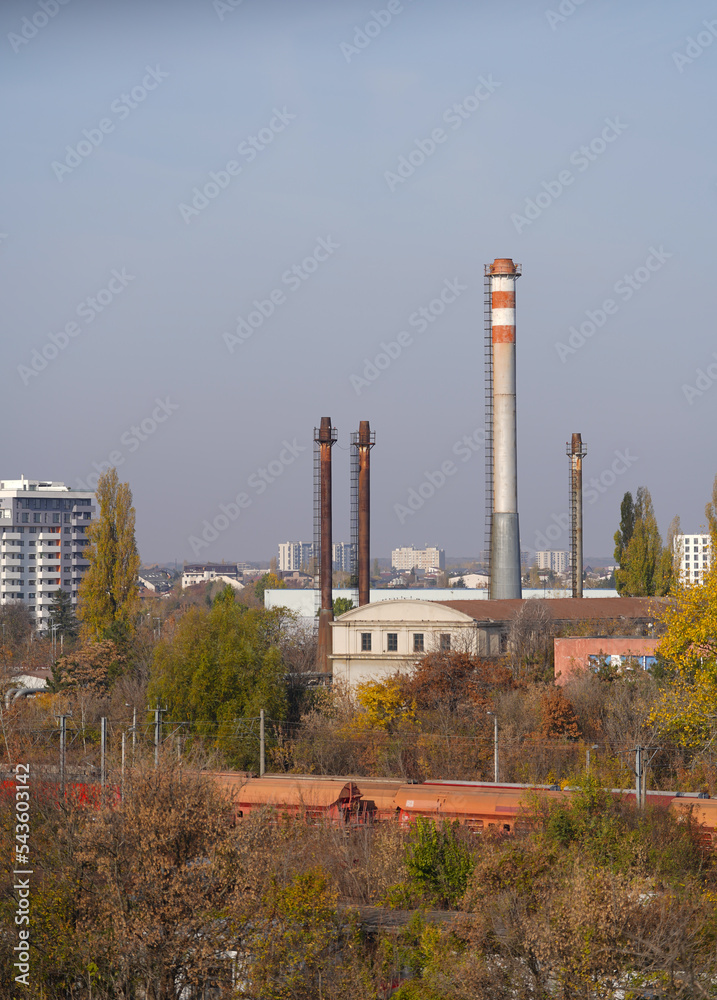The chimney of a thermal power plant, the smoke extracted by a thermal ...