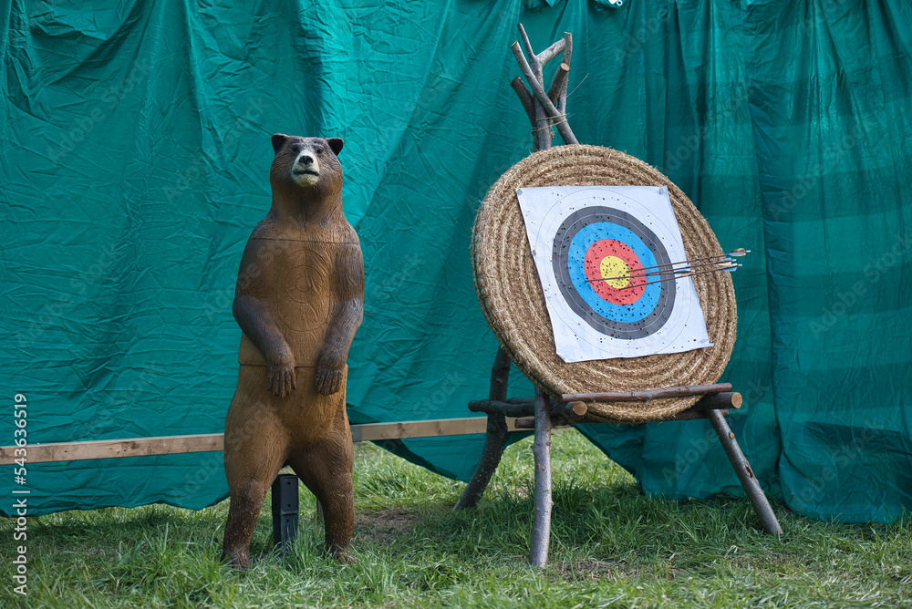 Shooting range for archery with target and dummy bear at a medieval ...