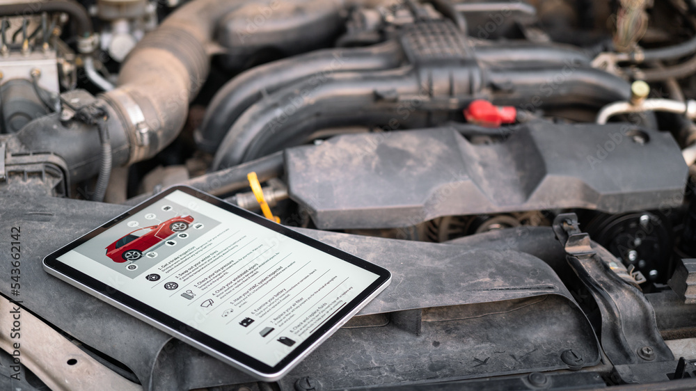 Using the vehicle checklist guideline on the digital tablet during ...