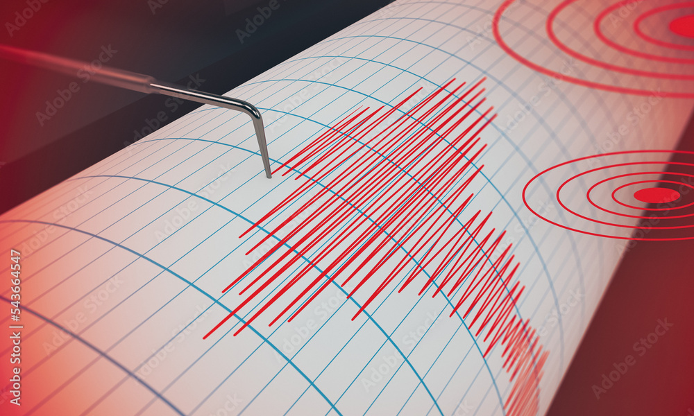 seismograph machine needle drawing a red line on graph paper depicting ...