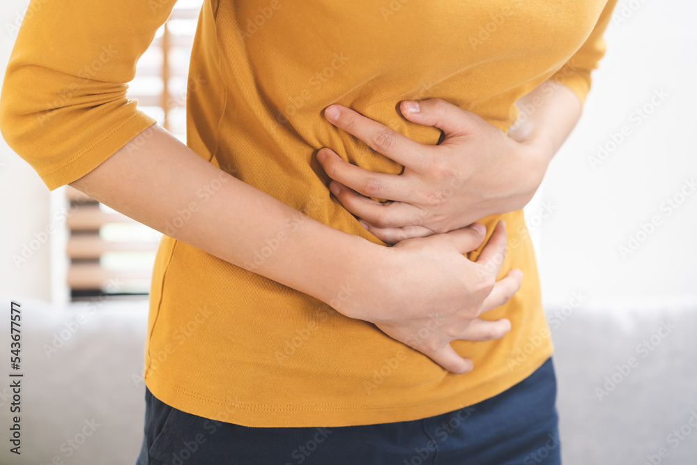 Flatulence asian young woman, girl hand in stomach ache, suffer from ...
