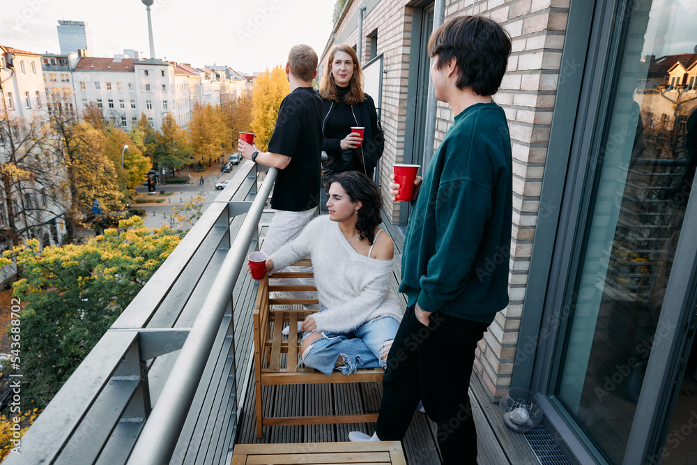 Friends on the balcony Stock Photo | Adobe Stock