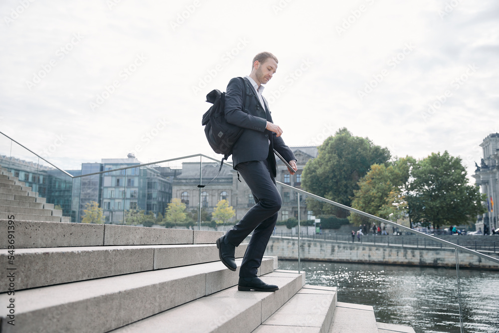 Businessman on his way to work Stock Photo | Adobe Stock