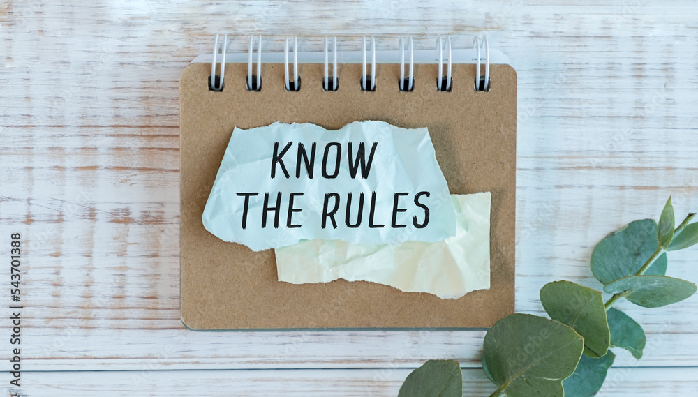 Know the Rules text on sticky notes with wooden background Stock Photo ...