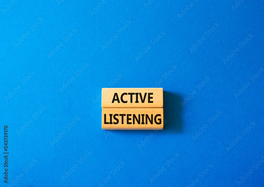 Active listening symbol. Wooden blocks with words Active listening ...