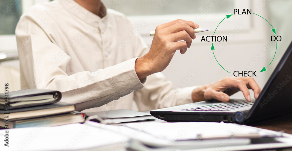 Foto de Businessman writing graph diagram Plan DO CHECK Action at ...