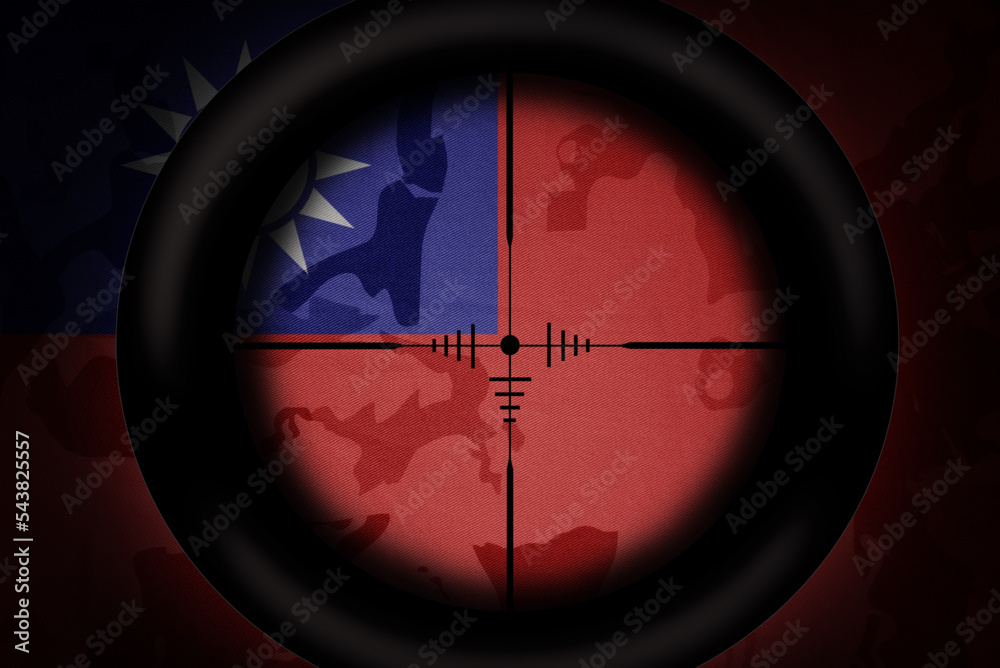sniper scope aimed at flag of taiwan on the khaki texture background ...