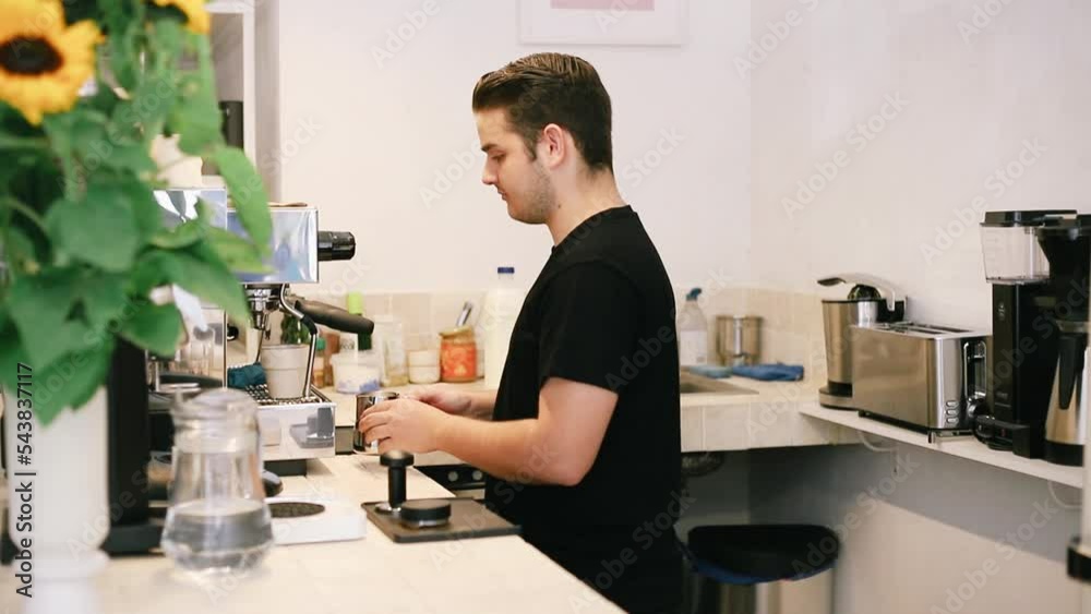 Person loading coffee machine Stock Video | Adobe Stock