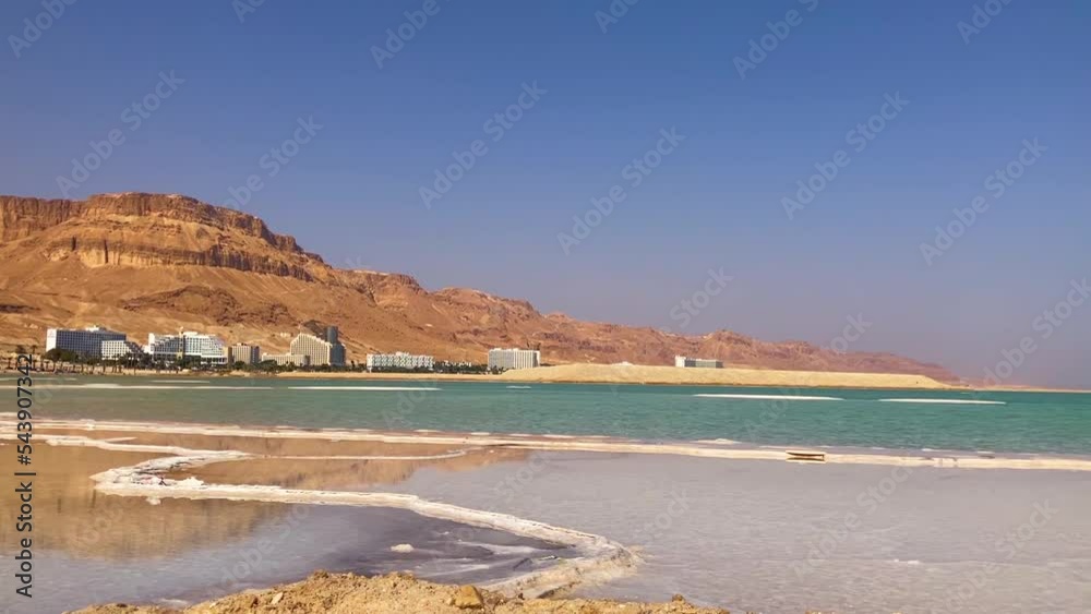 Ein Bokek resort on the Dead Sea in Israel. The majestic mountains of ...