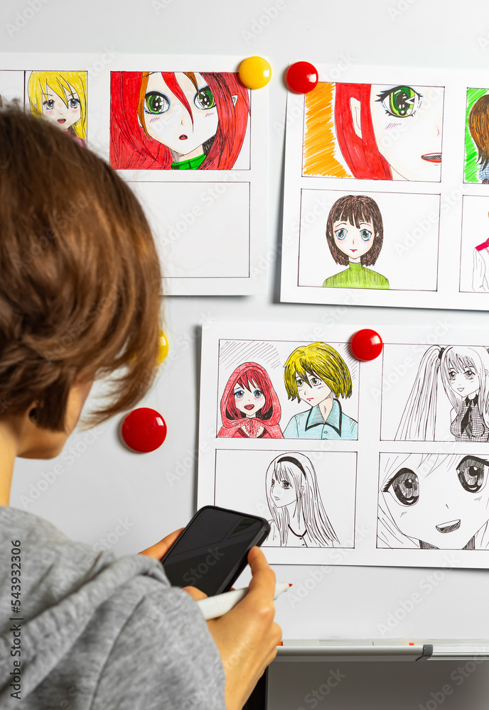 An artist draws a storyboard of an anime comics book. Manga style ...