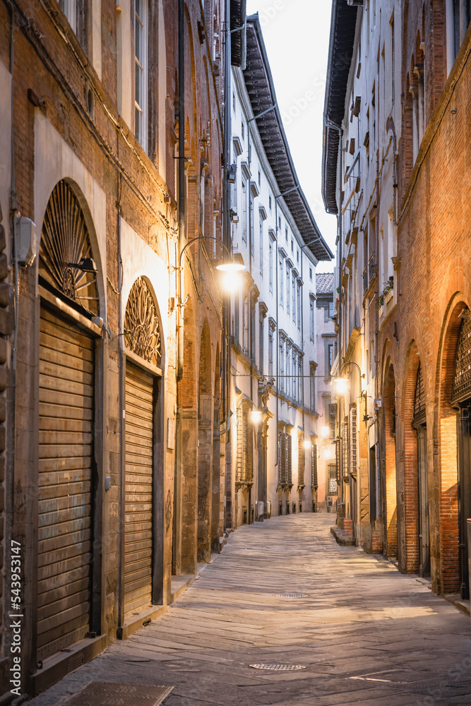 streets of old city pisa at sunset Stock Photo | Adobe Stock