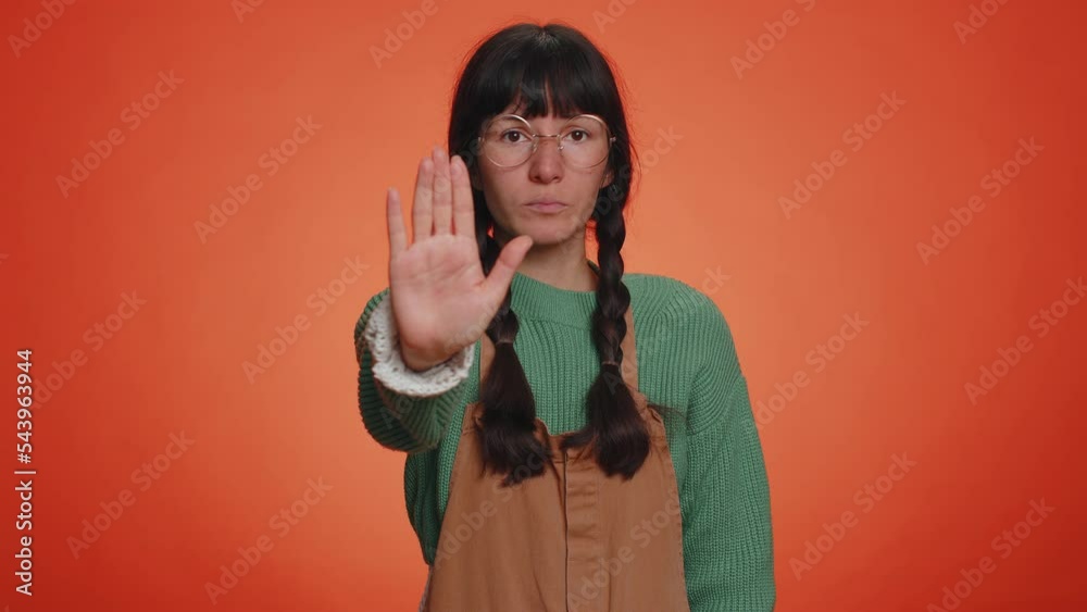 No stop. Serious adult woman say No, hold palm folded crossed hands in ...