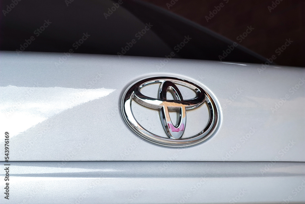 Toyota logo on the car. Toyota Motor Corporation is a Japanese ...