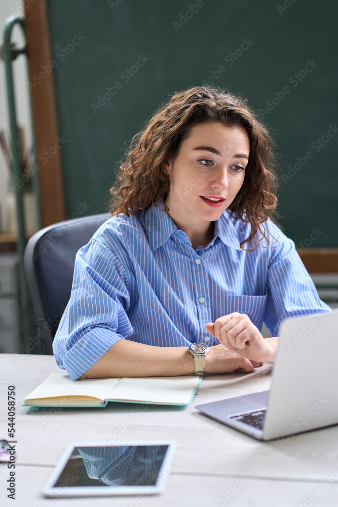 Female online teacher teaching remote virtual distance class in ...
