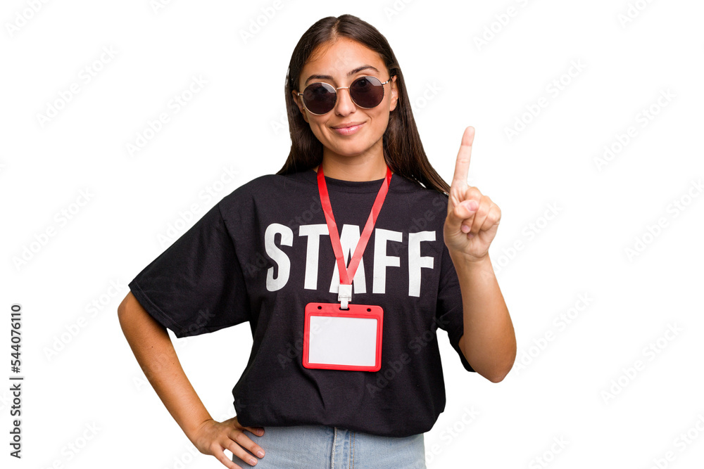 Young caucasian staff woman wearing a badge isolated showing number one ...