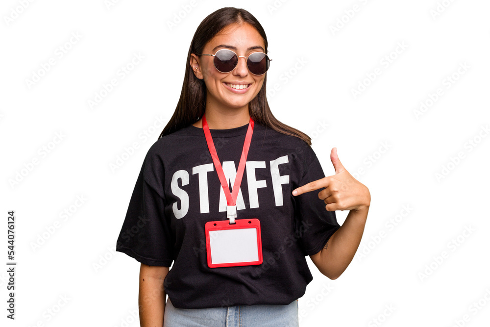 Young caucasian staff woman wearing a badge isolated person pointing by ...