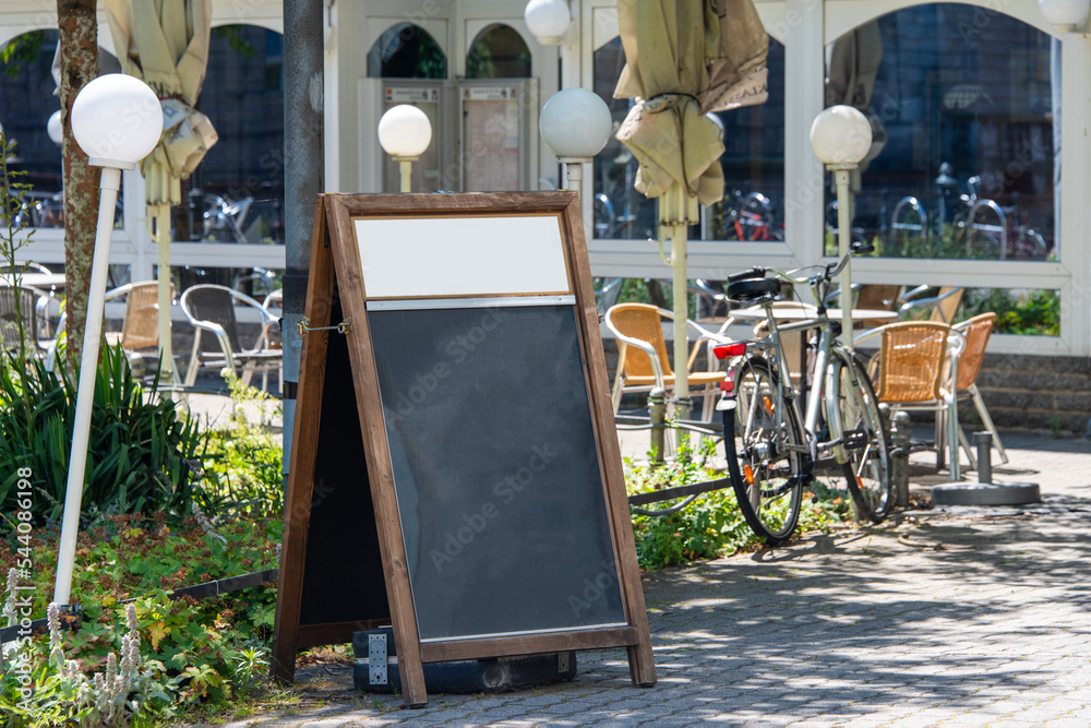 Blank restaurant shop sign or menu boards near the entrance to ...