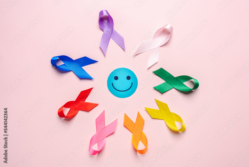 Happy smiley face on center with Multi colorful ribbons, cancer ...