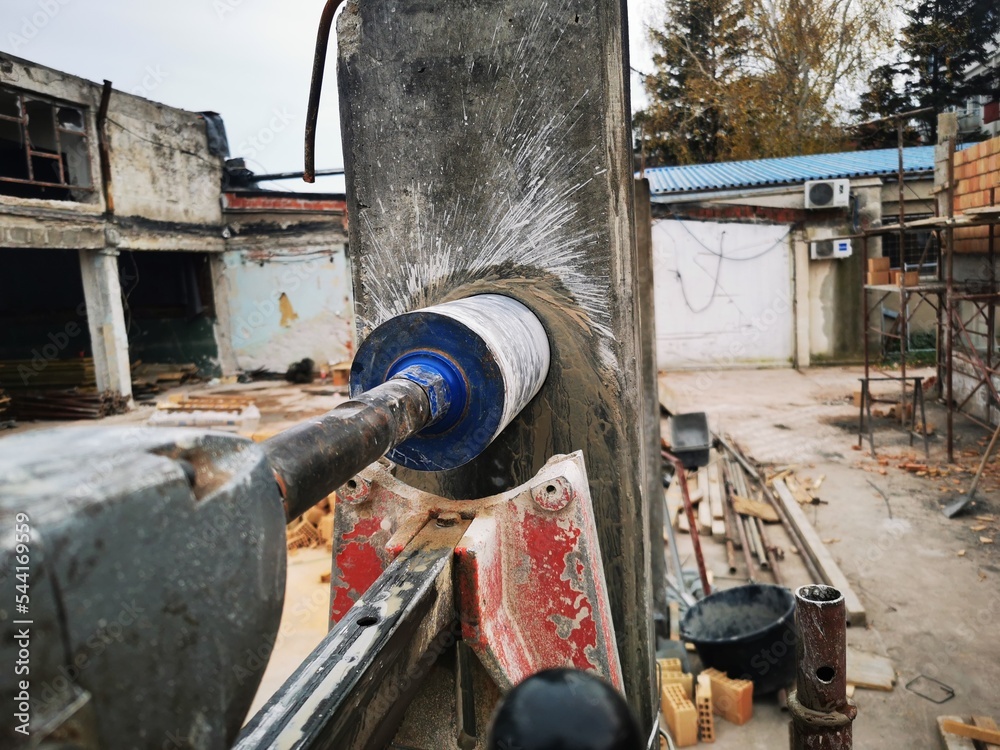 Hole cutting machine. Drilling concrete with an industrial drilling ...