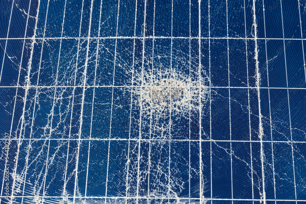 Broken destroyed cracked hole in solar panel after hail storm Stock ...