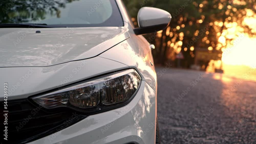 Close up view of front light of car headlights. unrecognizable white ...
