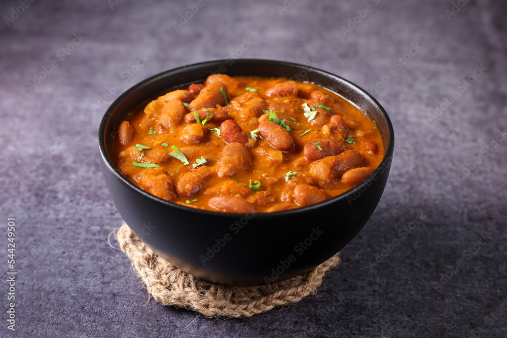 Kidney bean curry or rajma or rajmah chawal and rice roti, typical ...