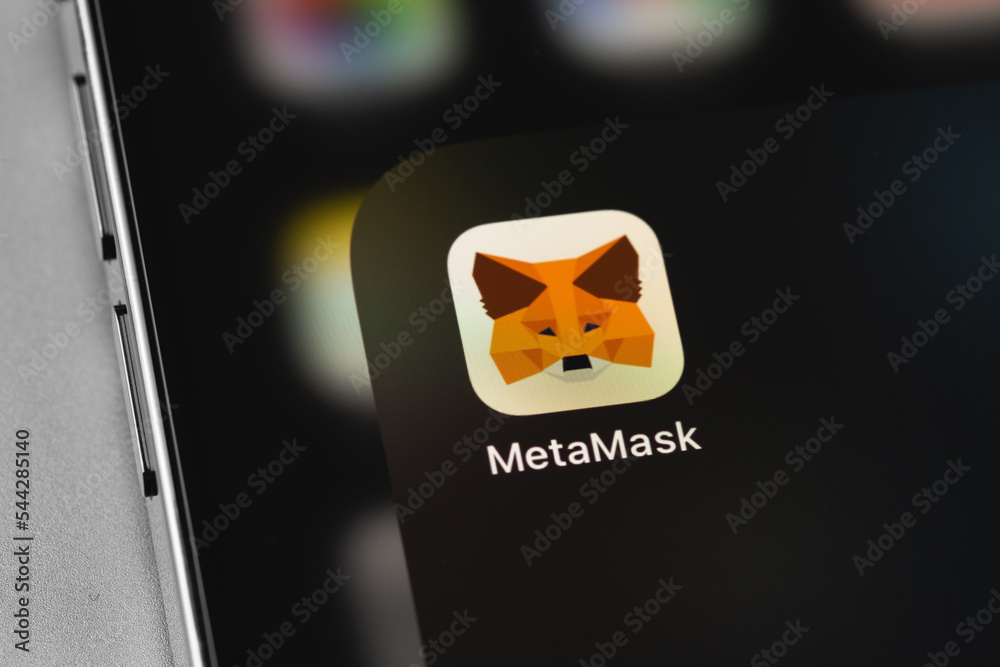 MetaMask mobile app icon on the screen smartphone iPhone. MetaMask is a ...