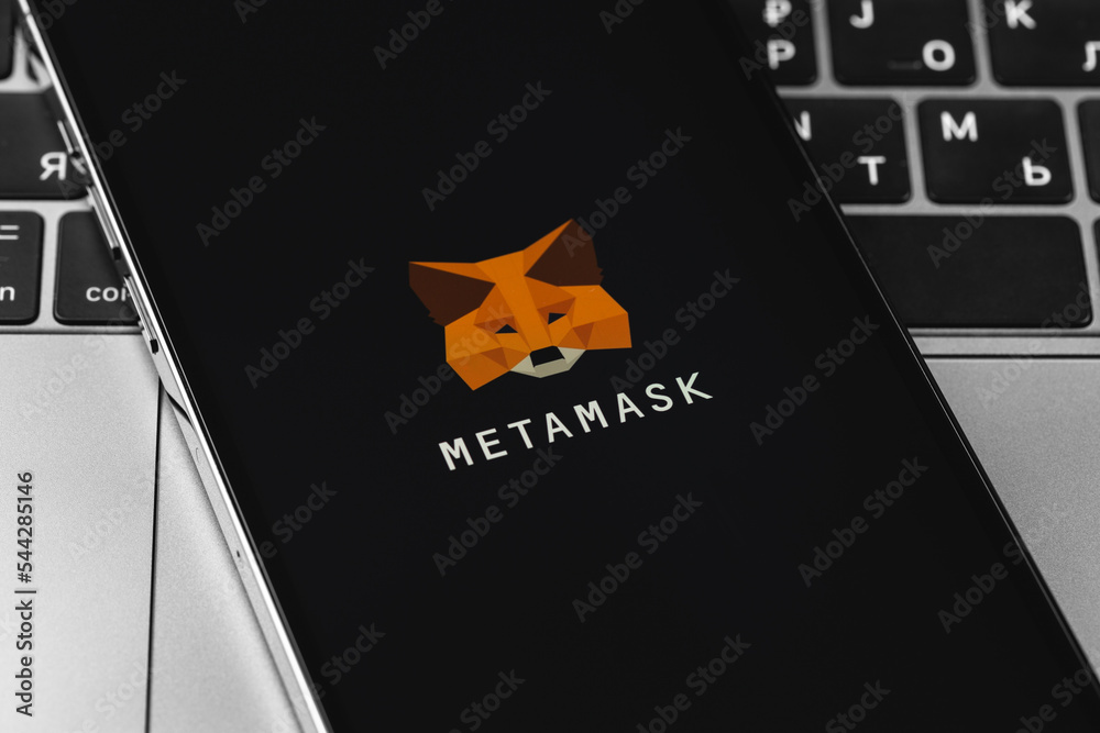 MetaMask logo app on the screen smartphone iPhone. MetaMask is a ...
