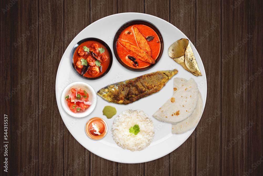 Malwani fish thali. Assorted Indian seafood dishes. Bangda Fry, Crabs ...