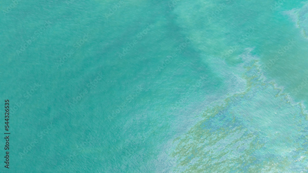 Oil spill in sea water. Gasoline leaks into the ocean. Dirty water in ...