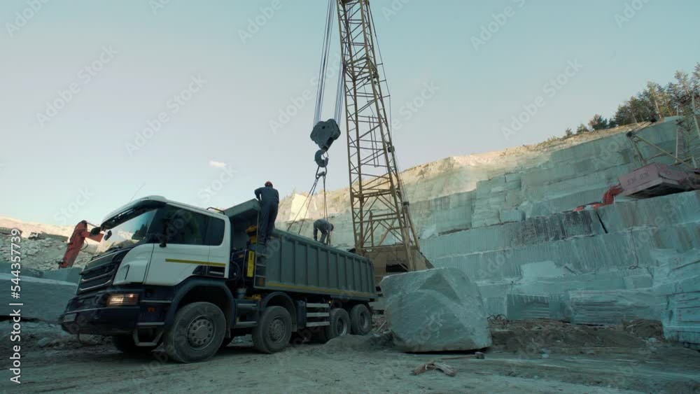 Mining Industry Quarry Workers Unfasten Granite Stone From Crane Hook ...