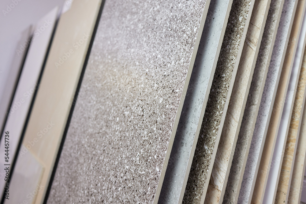 Exposition of ceramics in a showroom new tiling option for floors and ...