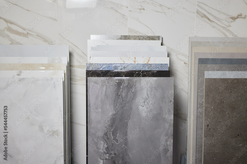 Exposition of ceramics in a showroom new tiling option for floors and ...