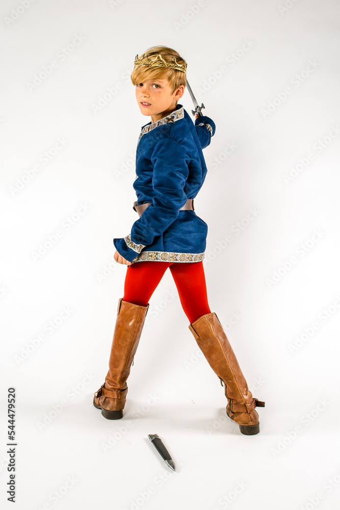 Child youth boy dressed as a cosplay prince ready for battle with his ...
