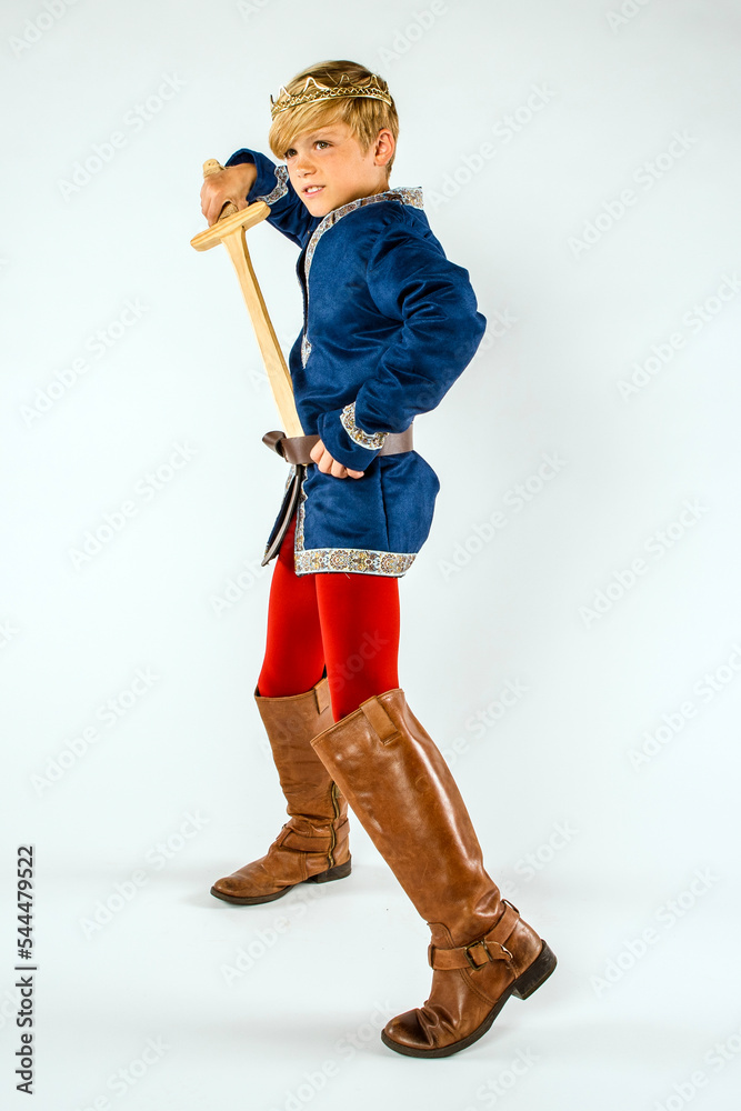 Child youth boy dressed as a cosplay prince ready for battle with his ...