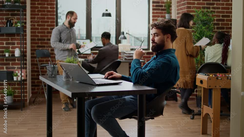 Business men brainstorming ideas to plan data report online on laptop ...