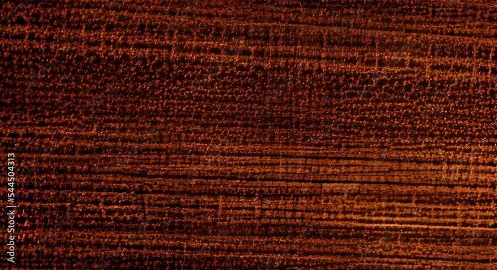 Brown textile texture background of a scratchy burlack material in an ...