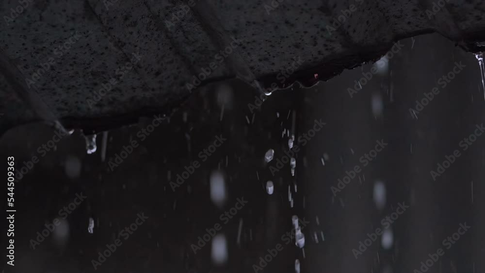 Raindrops Falling From Roof, Rain on a Corrugated Iron Roof. Heavy rain ...