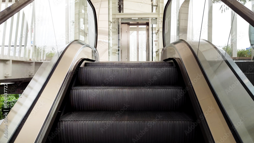 Modern luxury escalators with staircase Escalator in Community Mall ...
