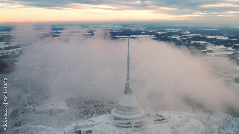 Building of hotel in Jested tower covered with dense fog cloud on ...