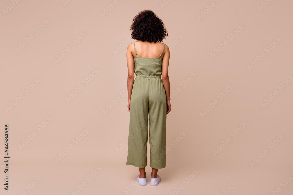 Full size back photo of brunette woman stand wear overall boots ...