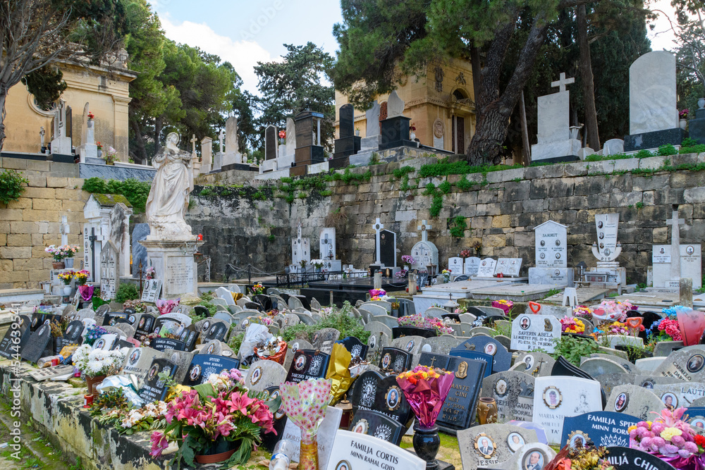 Gravestones at the Santa Maria Addolorata Cemetery in Paola, Malta. It ...