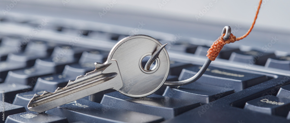 phishing, hacking personal data and money , key and hook on computer ...