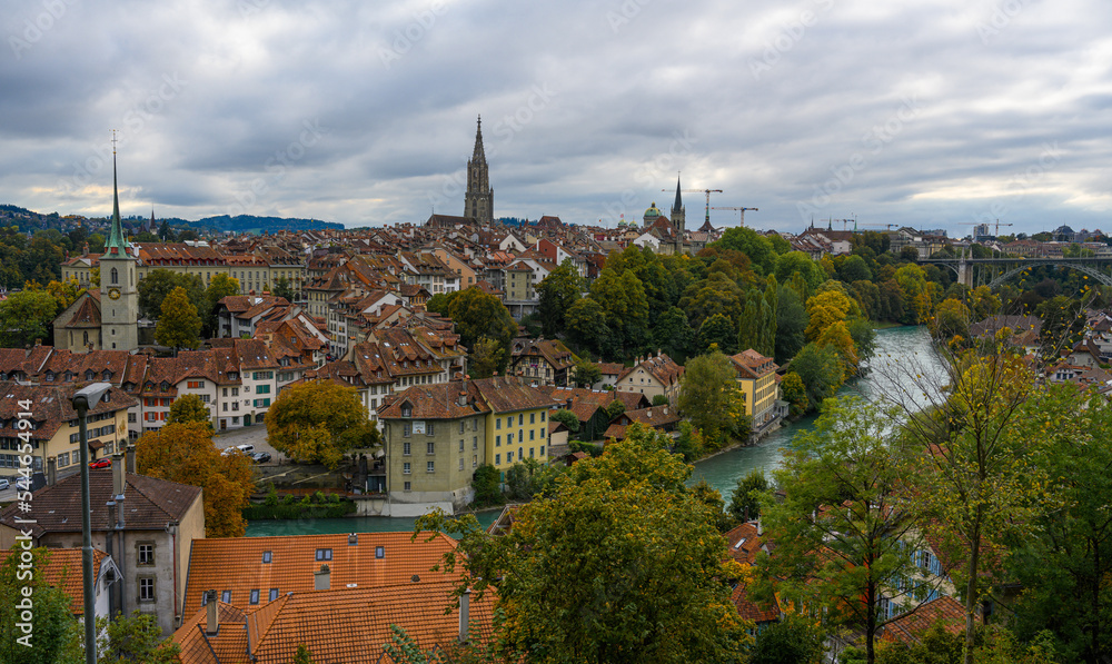 Panoramic view of Bern under blue sunny sky, with the Gothic tower of ...
