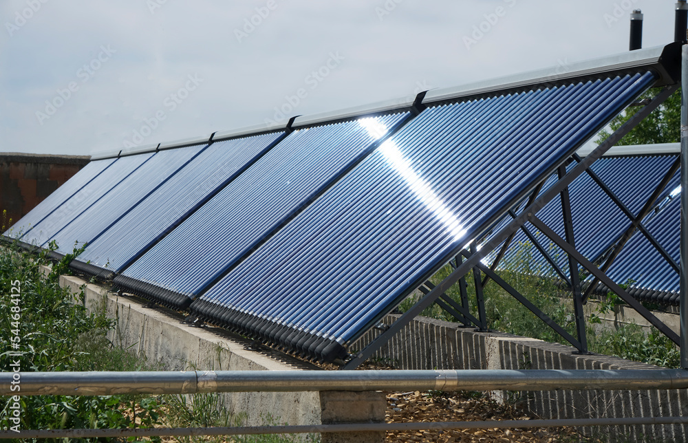 New generation solar cells. Closeup of vacuum solar water heating ...