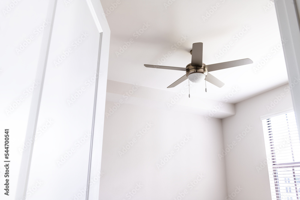 Empty bedroom room interior nobody looking up at ceiling fan open door ...