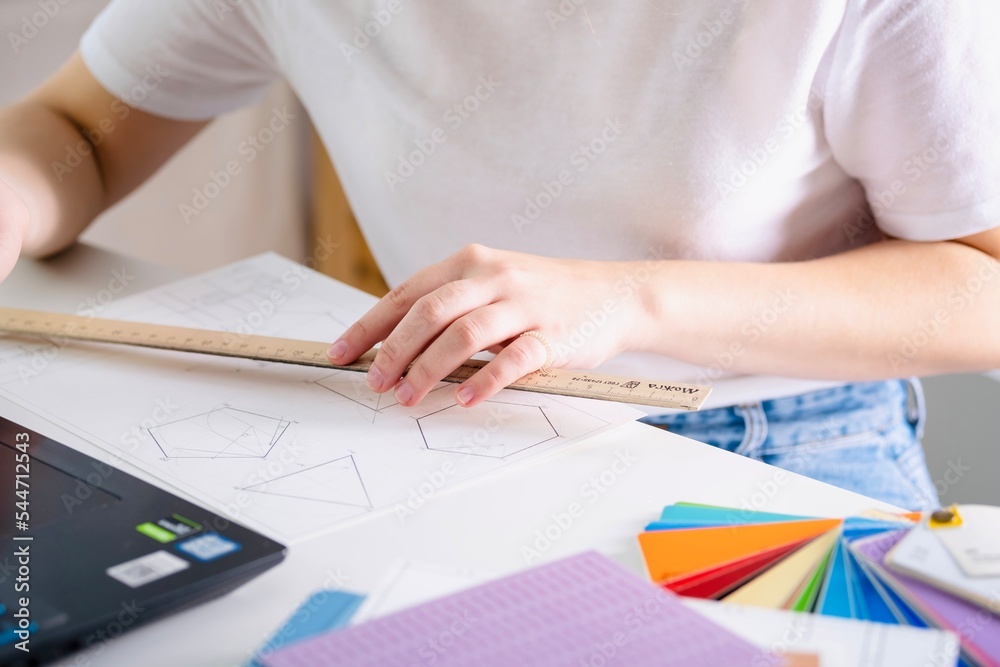 A young woman does her mechanical drawing homework. Mechanical drawing ...