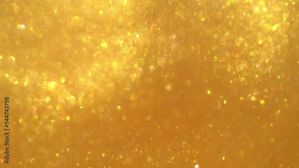 Waves motion of floating golden particles. Abstract gold luxury ...