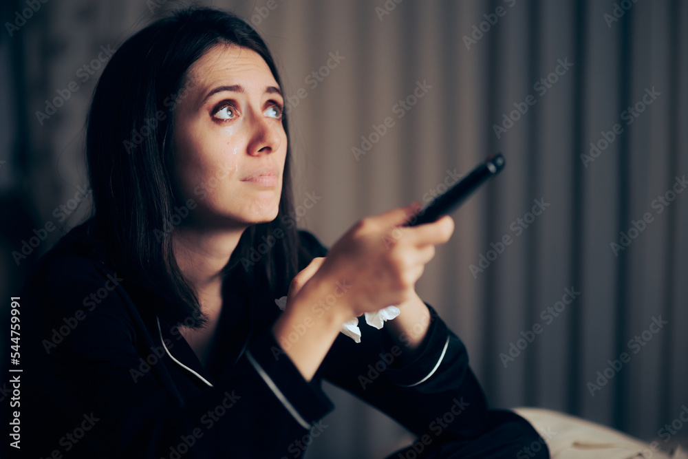 Sad Woman Crying Watching TV Holding a Remote Control. Unhappy lonely ...