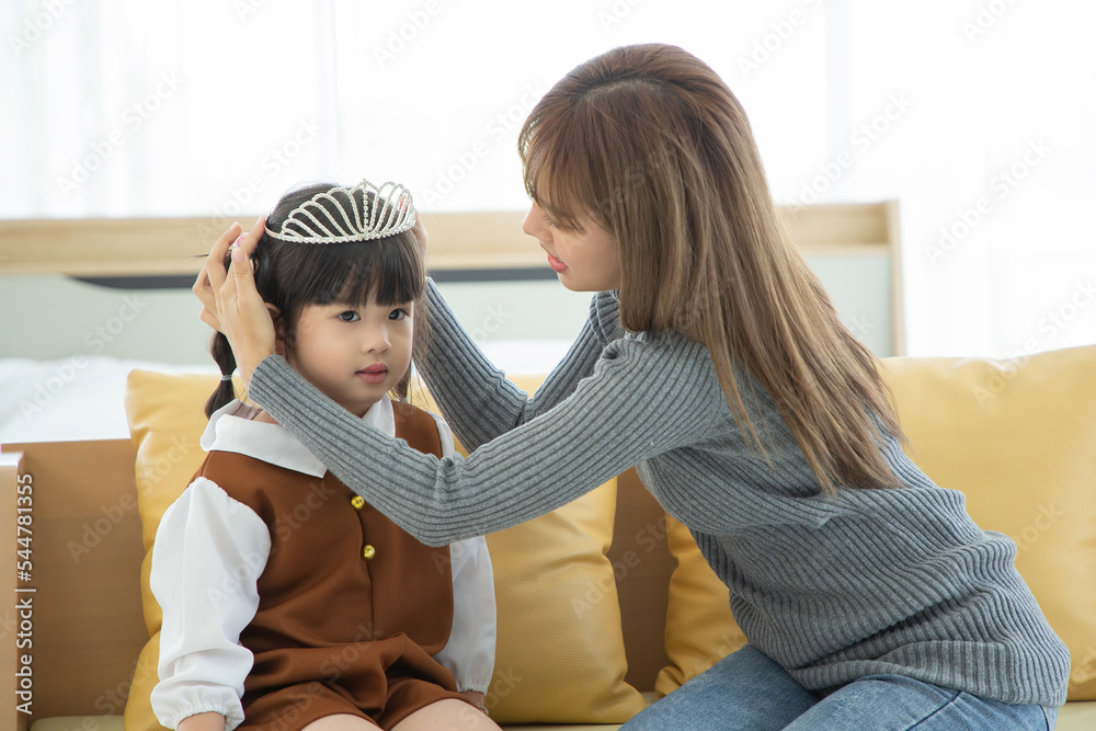 Happy loving family. Asian mother and her daughter child girl playing ...